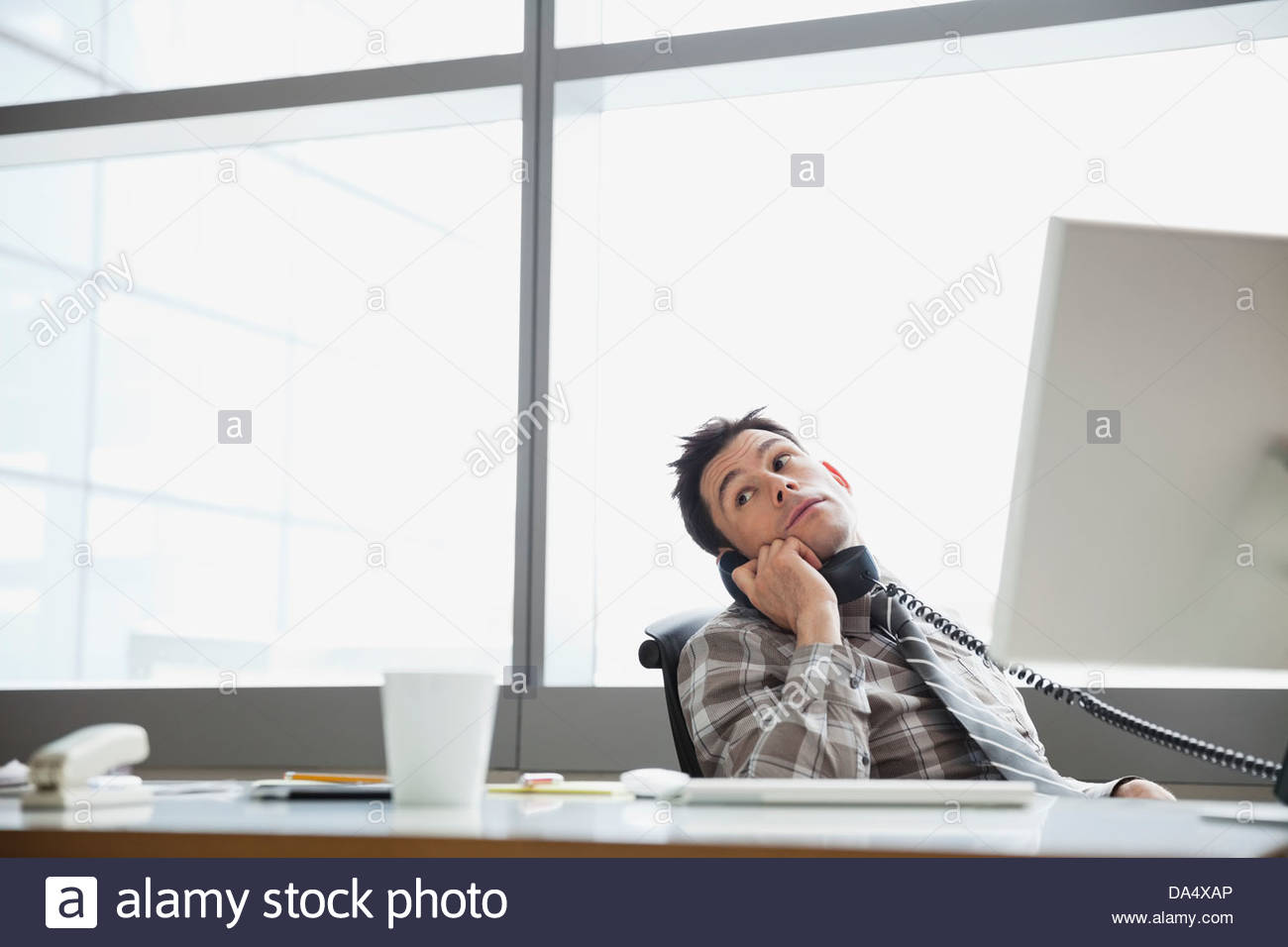 Slumped At Desk Stock Photos & Slumped At Desk Stock Images - Alamy