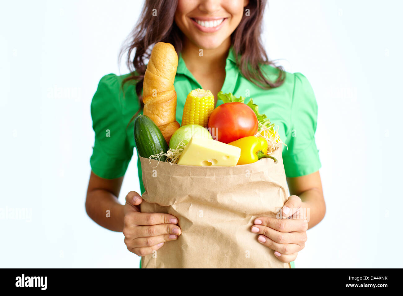 Image of big paper sack full of different fruits and vegetables in ...