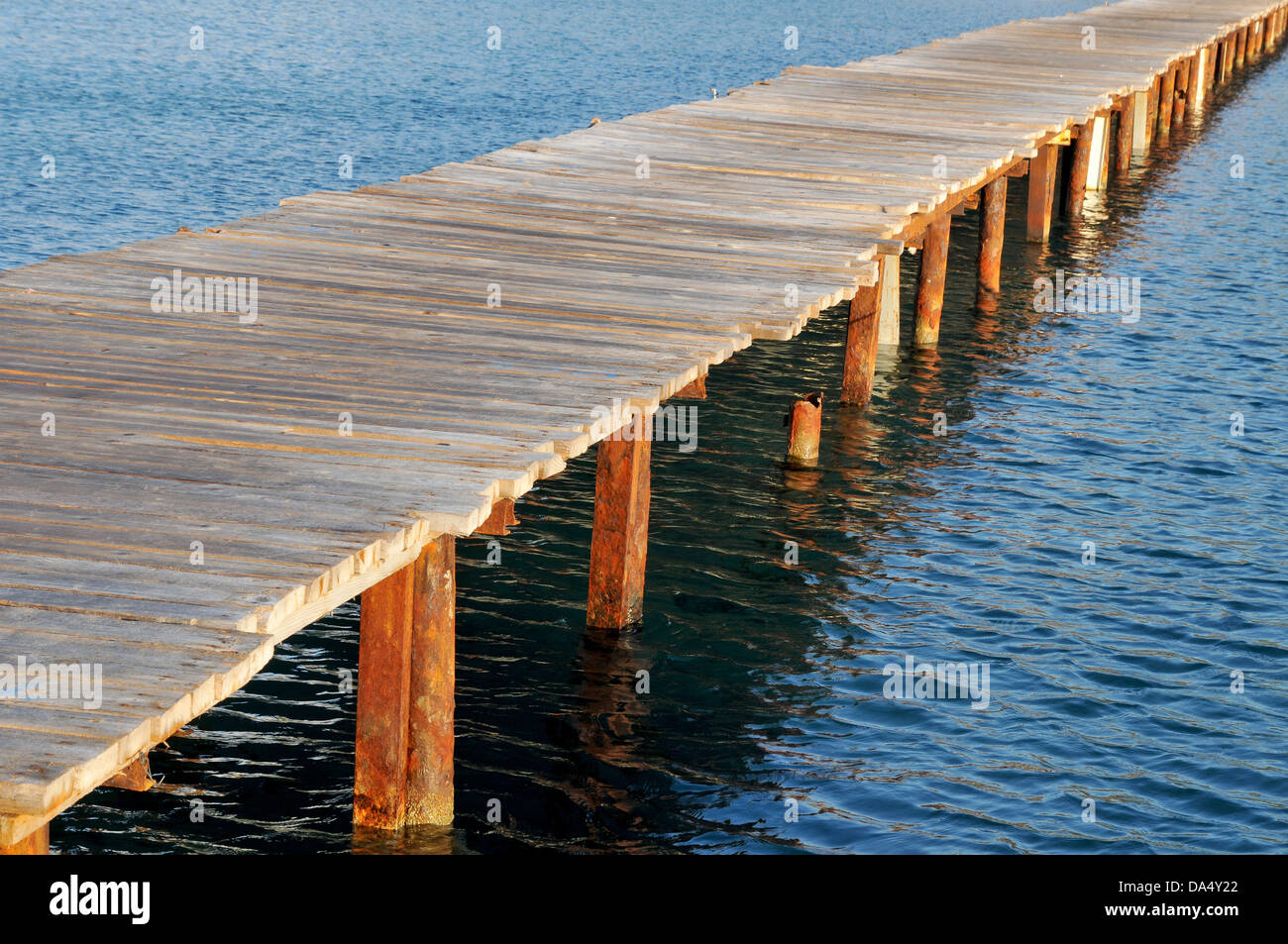 wooden pier,boardwalk, bridge, coastline Stock Photo - Alamy