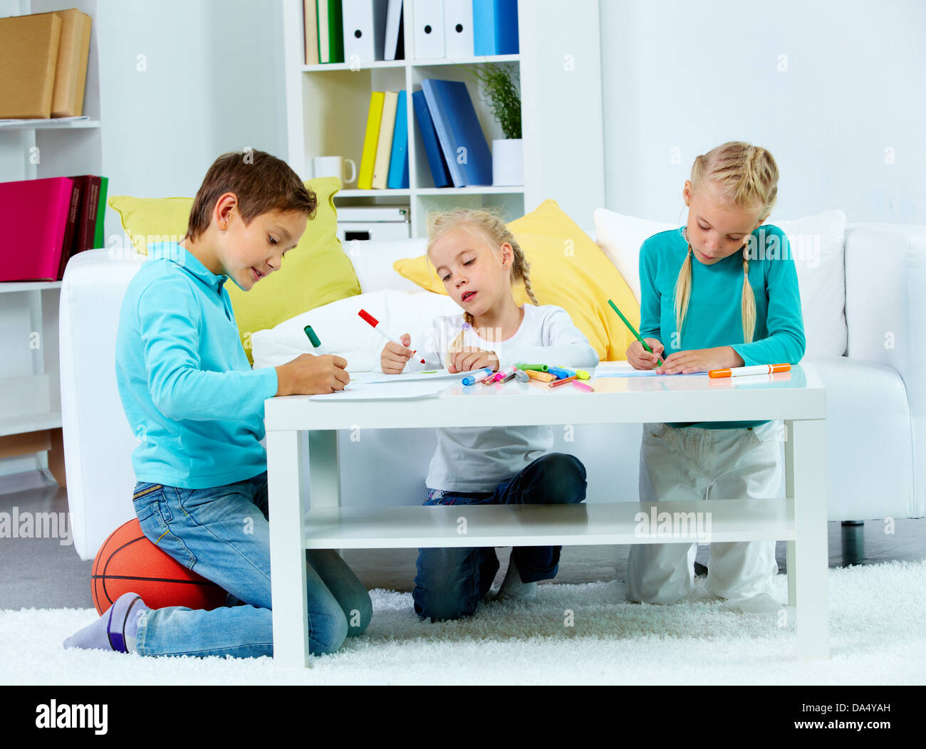 Three children drawing hi-res stock photography and images - Alamy