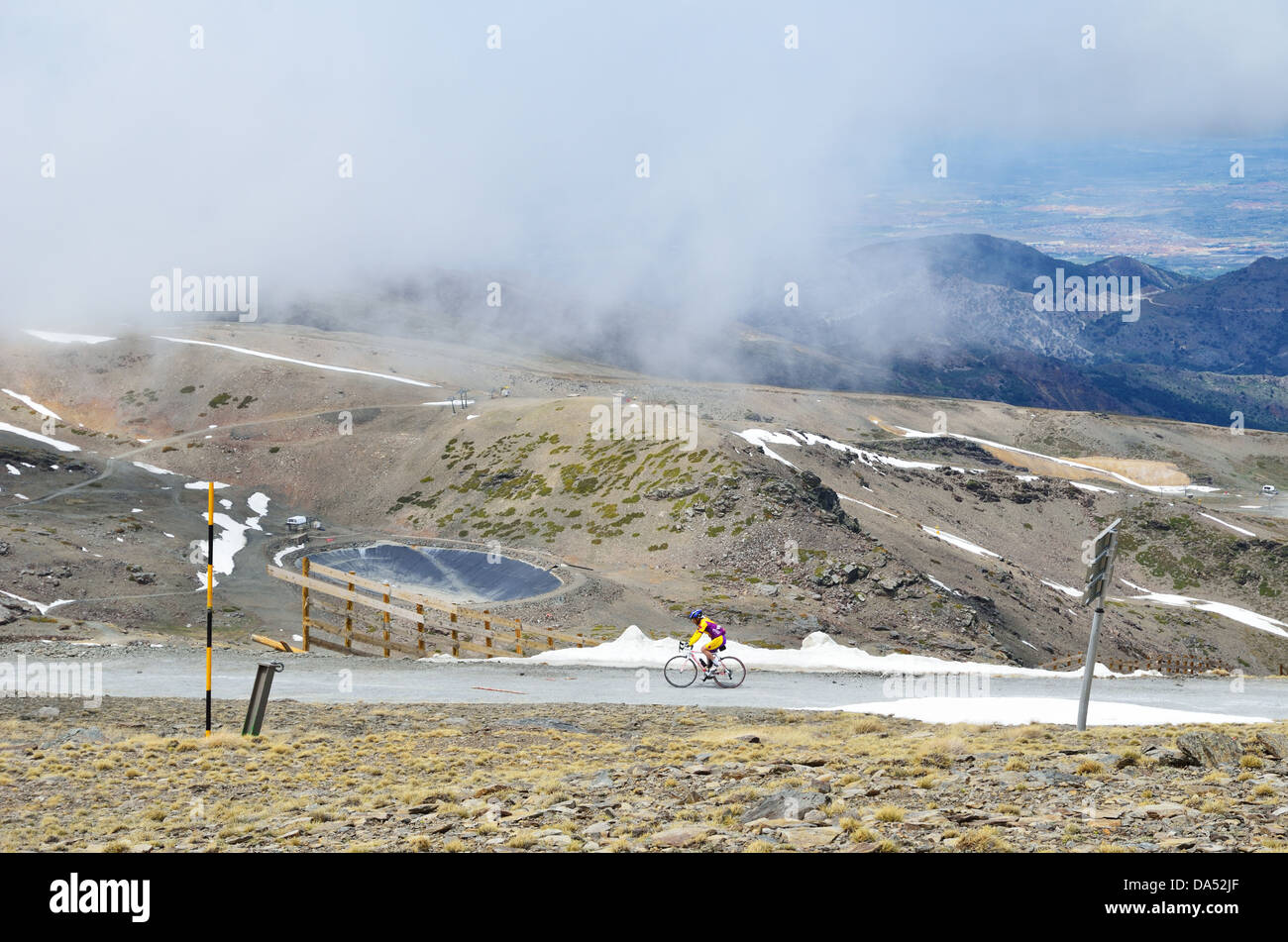 Biker in the spring mountains Stock Photo - Alamy