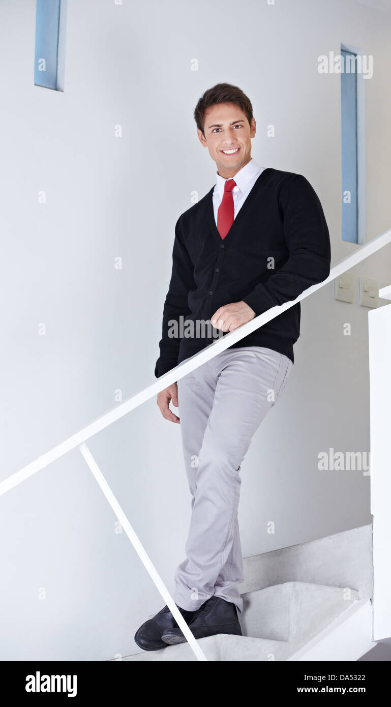 Businessman laughing office railing hi-res stock photography and images ...