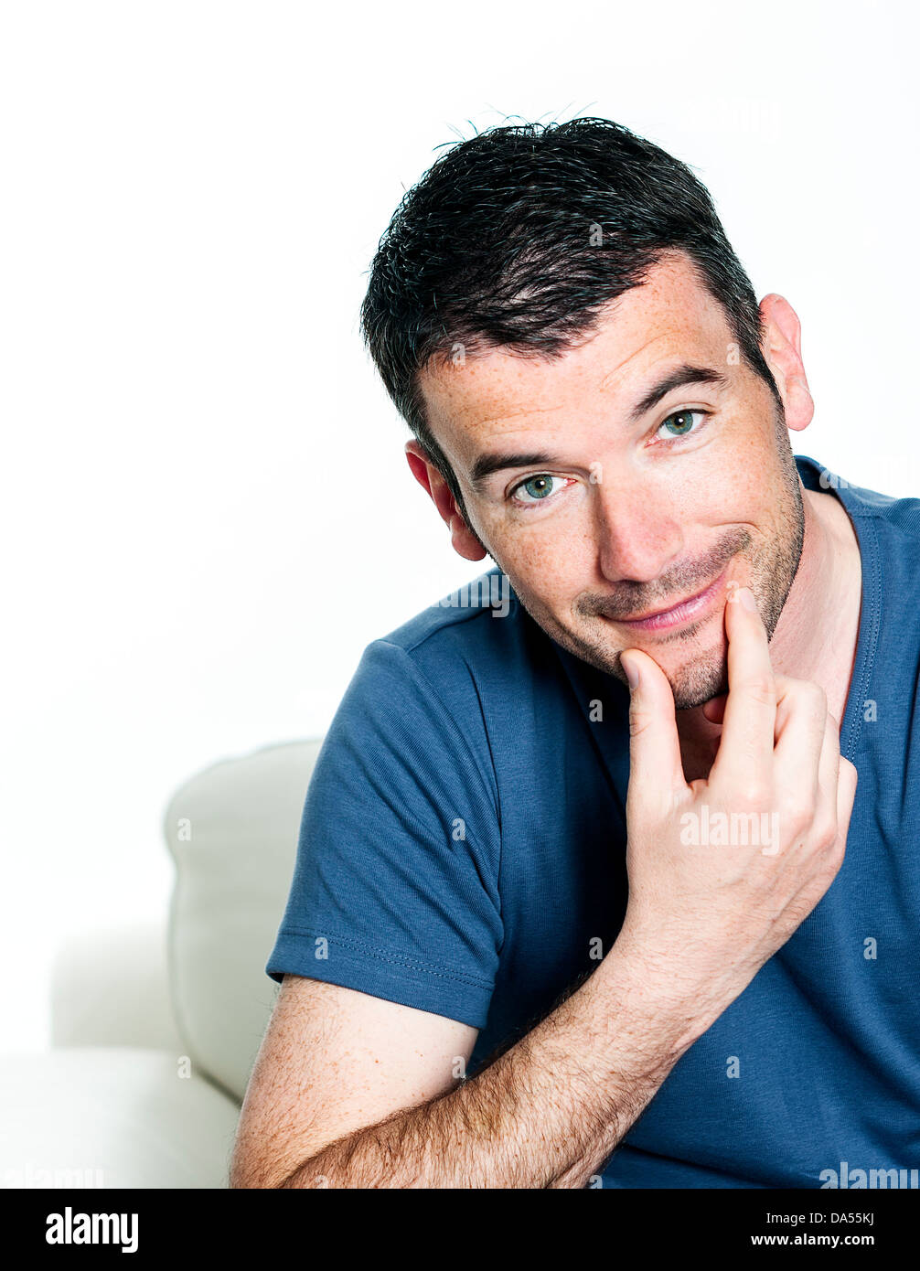 natural and relaxed looking young man Stock Photo - Alamy