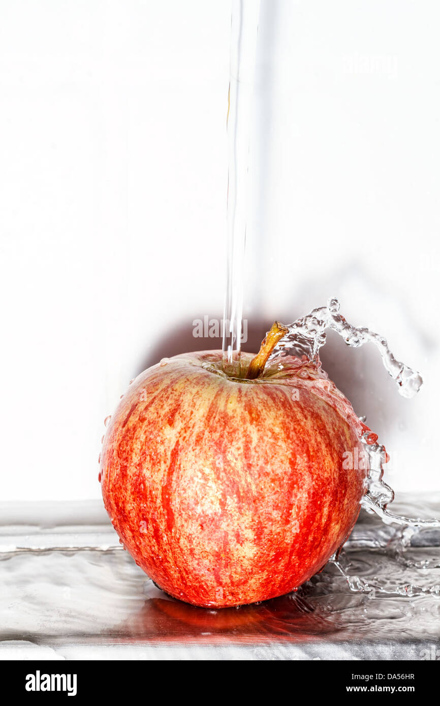 Water splashing on apple Stock Photo - Alamy