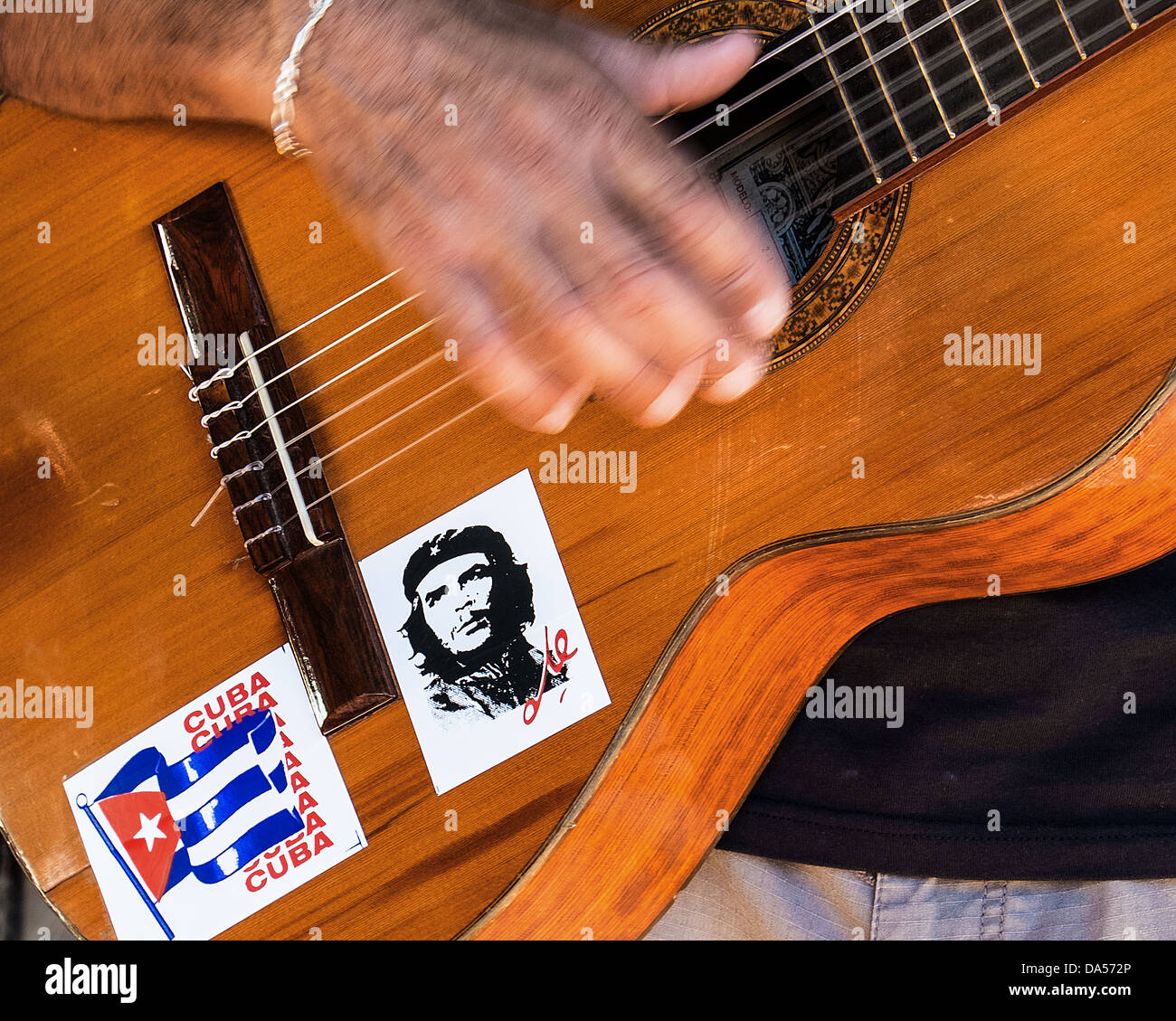 Hand strumming guitar hi-res stock photography and images - Alamy