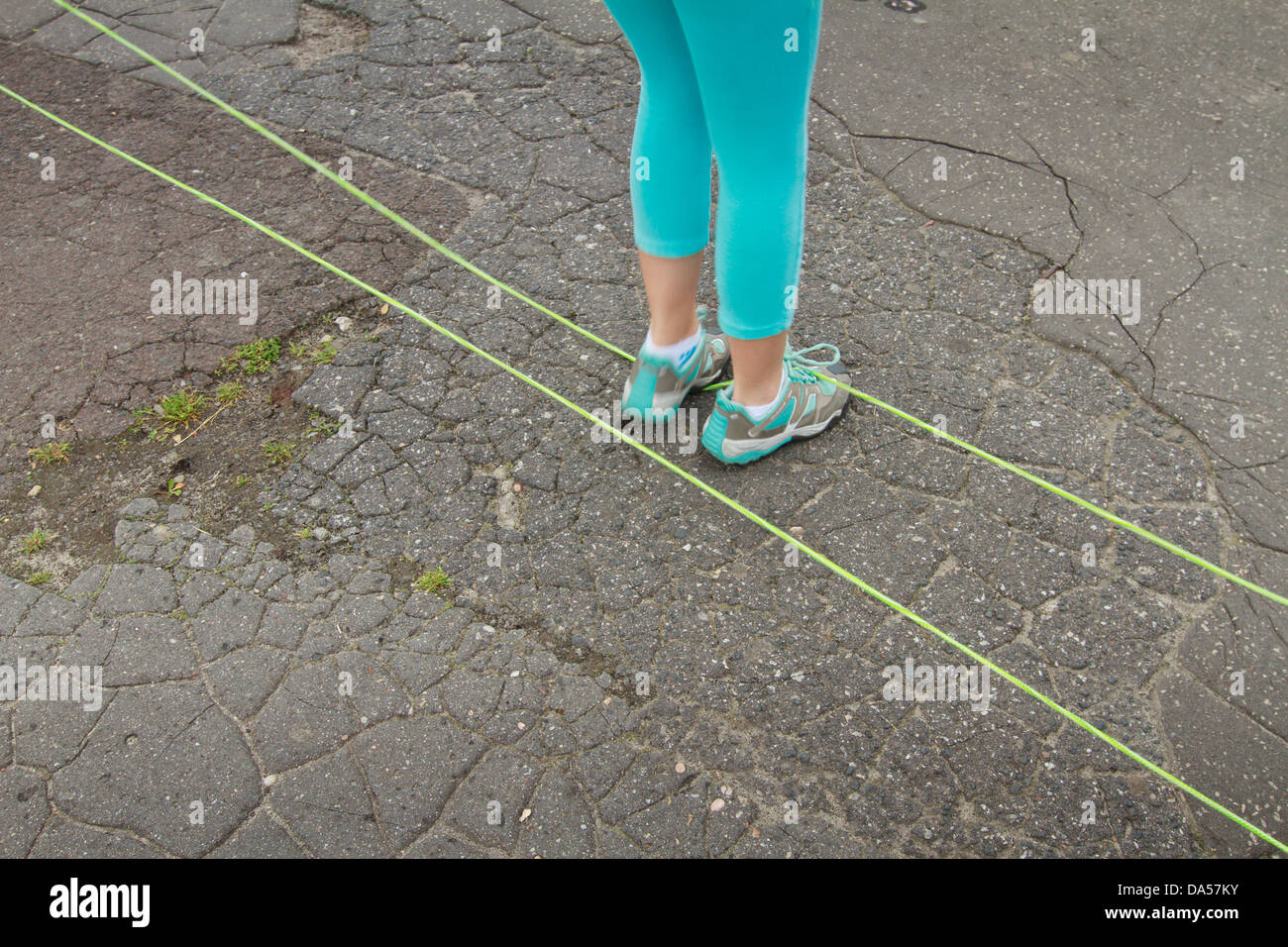 Playing with rubber rope Stock Photo - Alamy