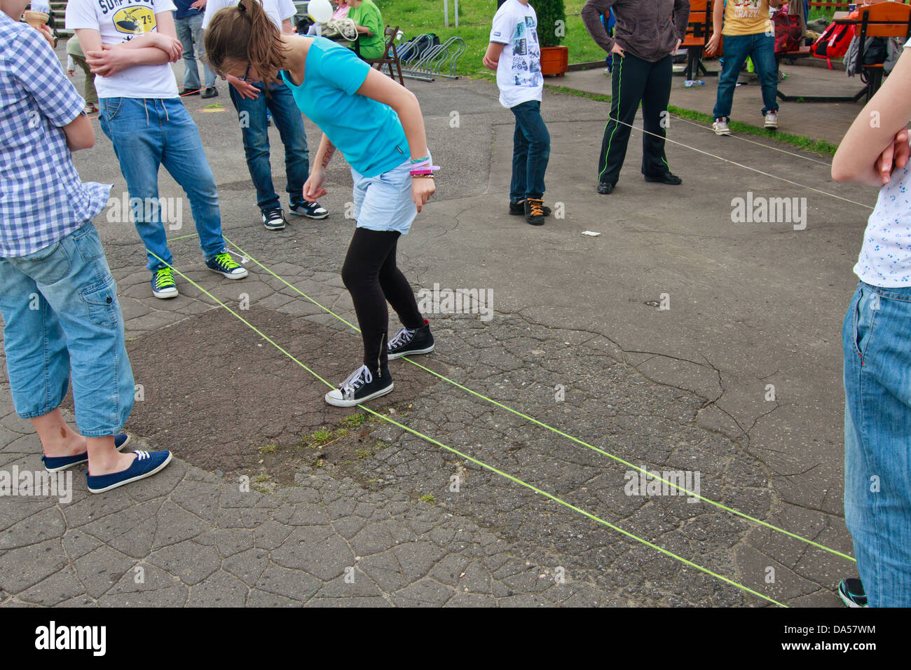Playing with rubber rope Stock Photo - Alamy