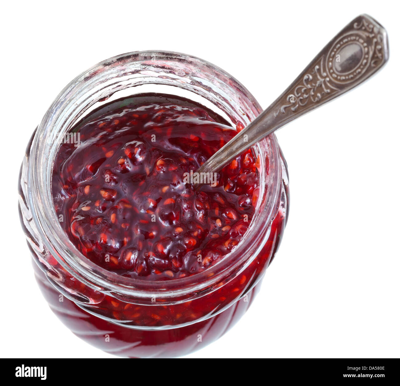 spoon in jar of raspberry jam isolated on white background Stock Photo ...