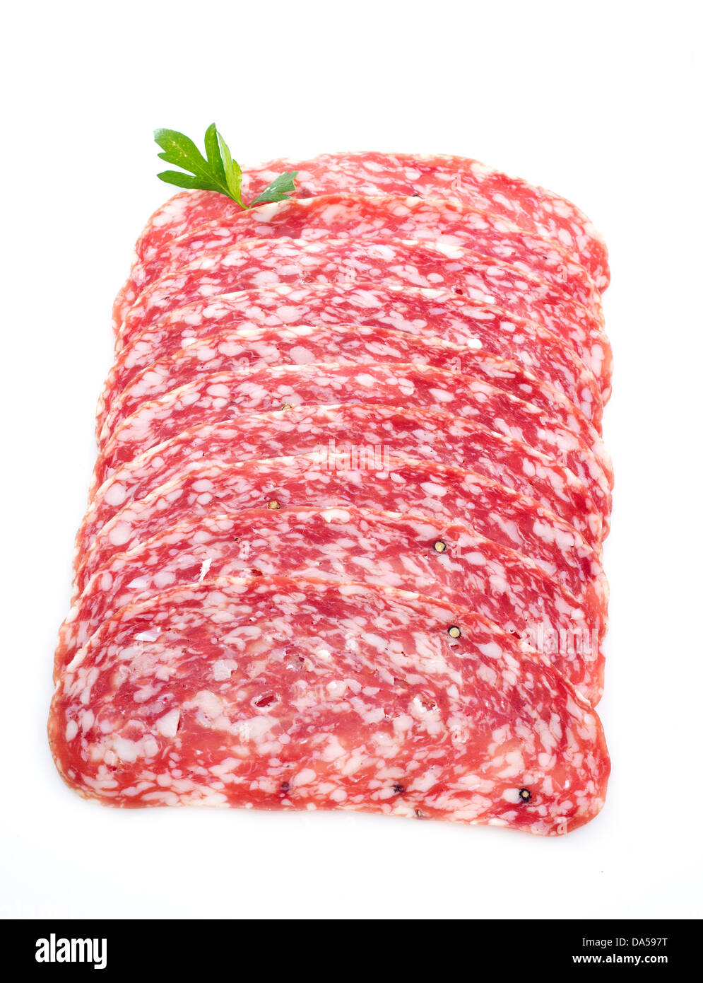 Sliced French saucisson in front of white background Stock Photo - Alamy