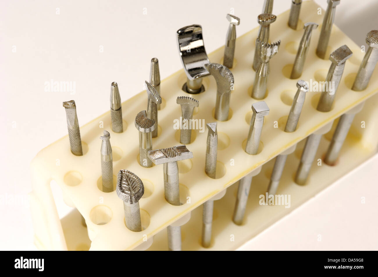 A set of USA leather work tools or punches in a stand Stock Photo - Alamy
