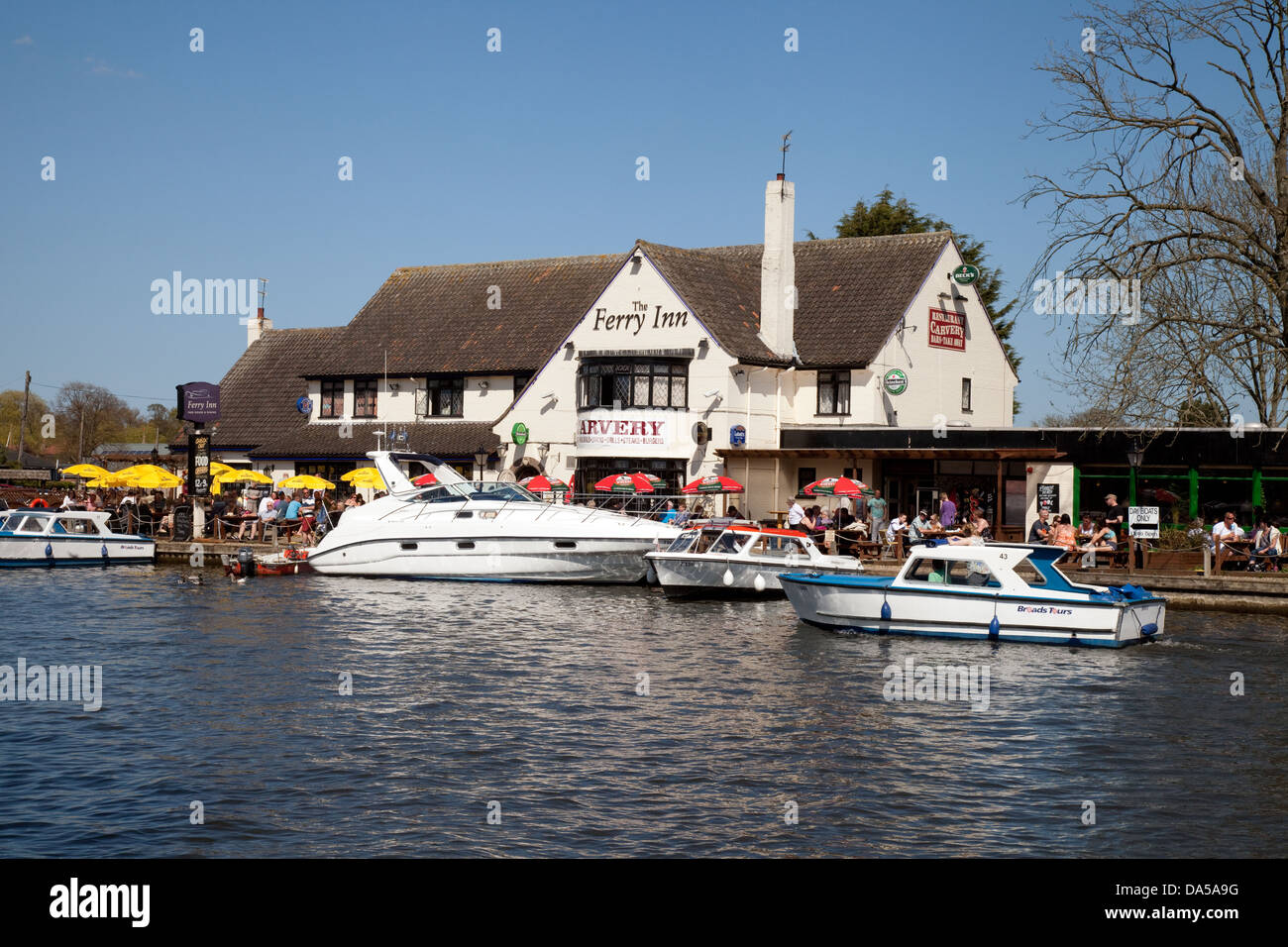 The Ferry Inn, the River Bure at Horning in summer, an example of a ...