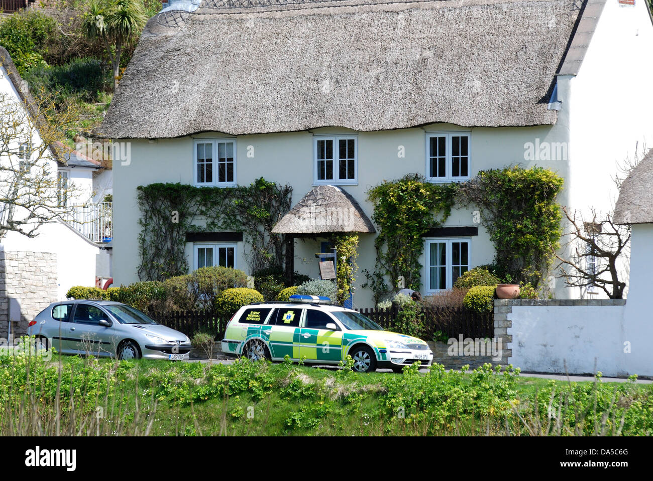 Ambulance paramedic parked outside a country cottage england uk Stock ...