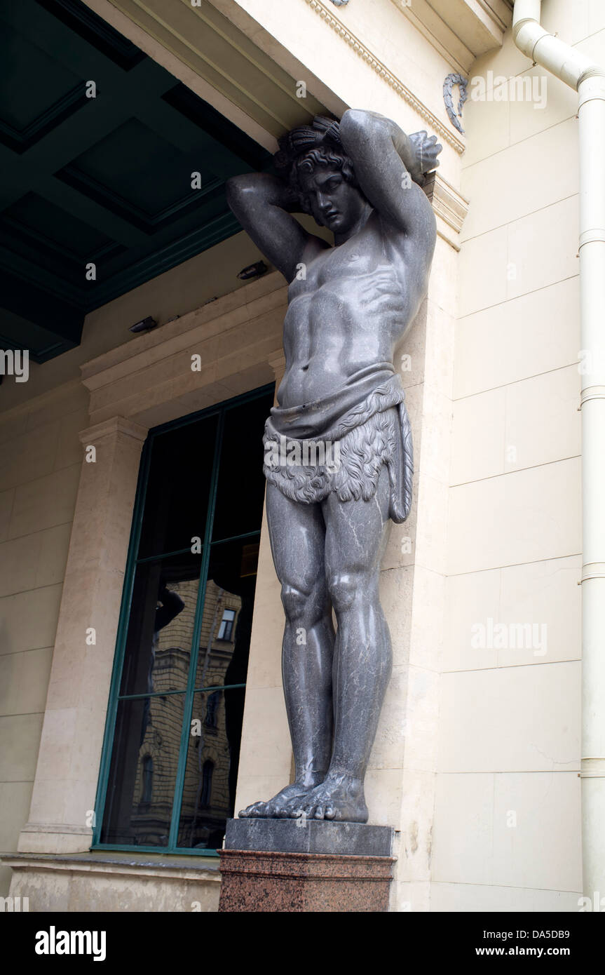Large sculpture of a Roman figure holding up a doorway in State ...