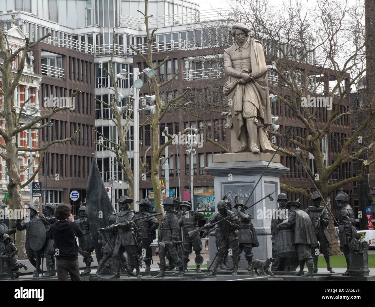 A tourist visit the Rembrant Monument - Memorial at the Rembrandtplein ...