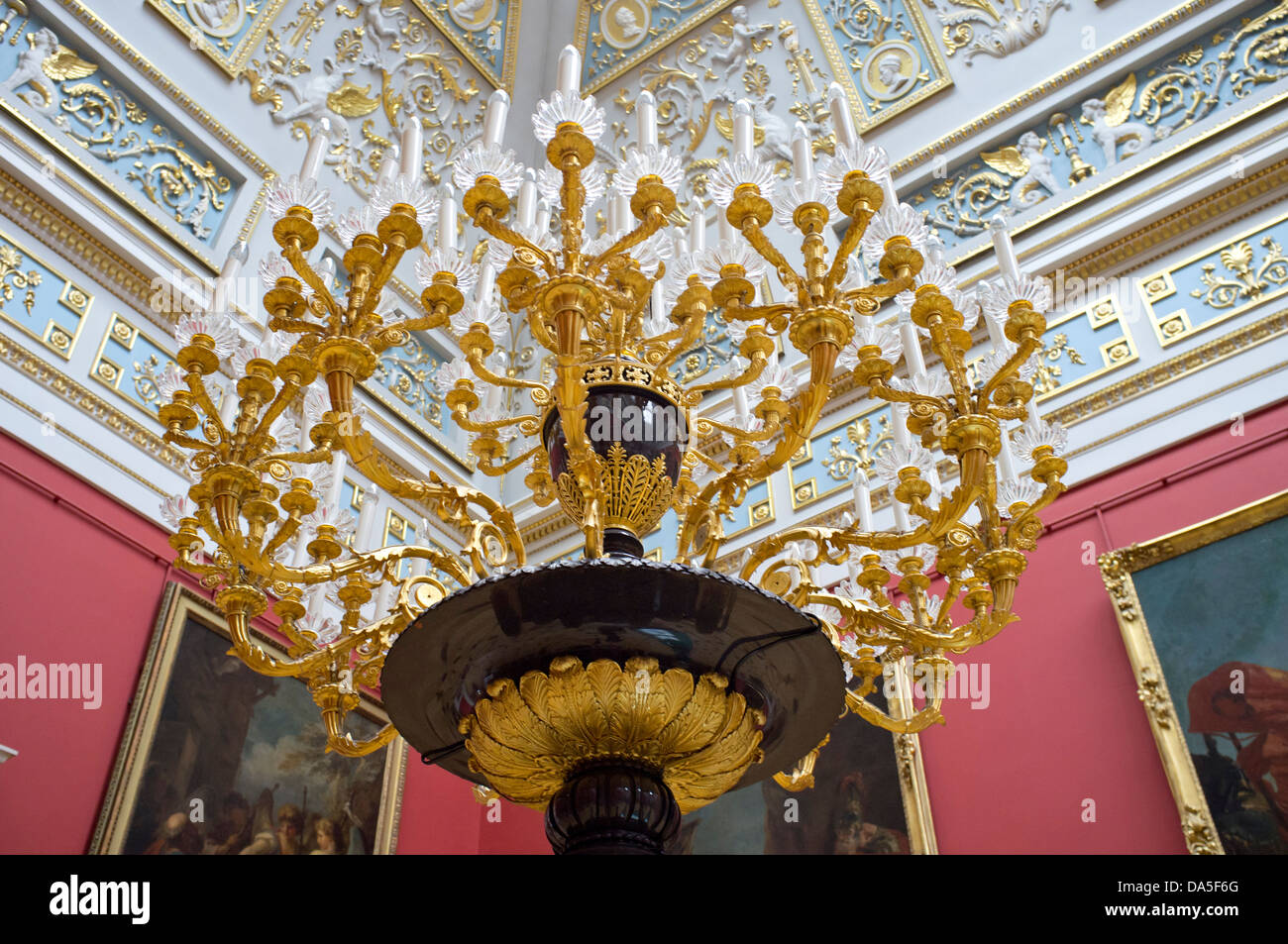 Candle chandelier in ornately decorated room in State Hermitage Museum ...
