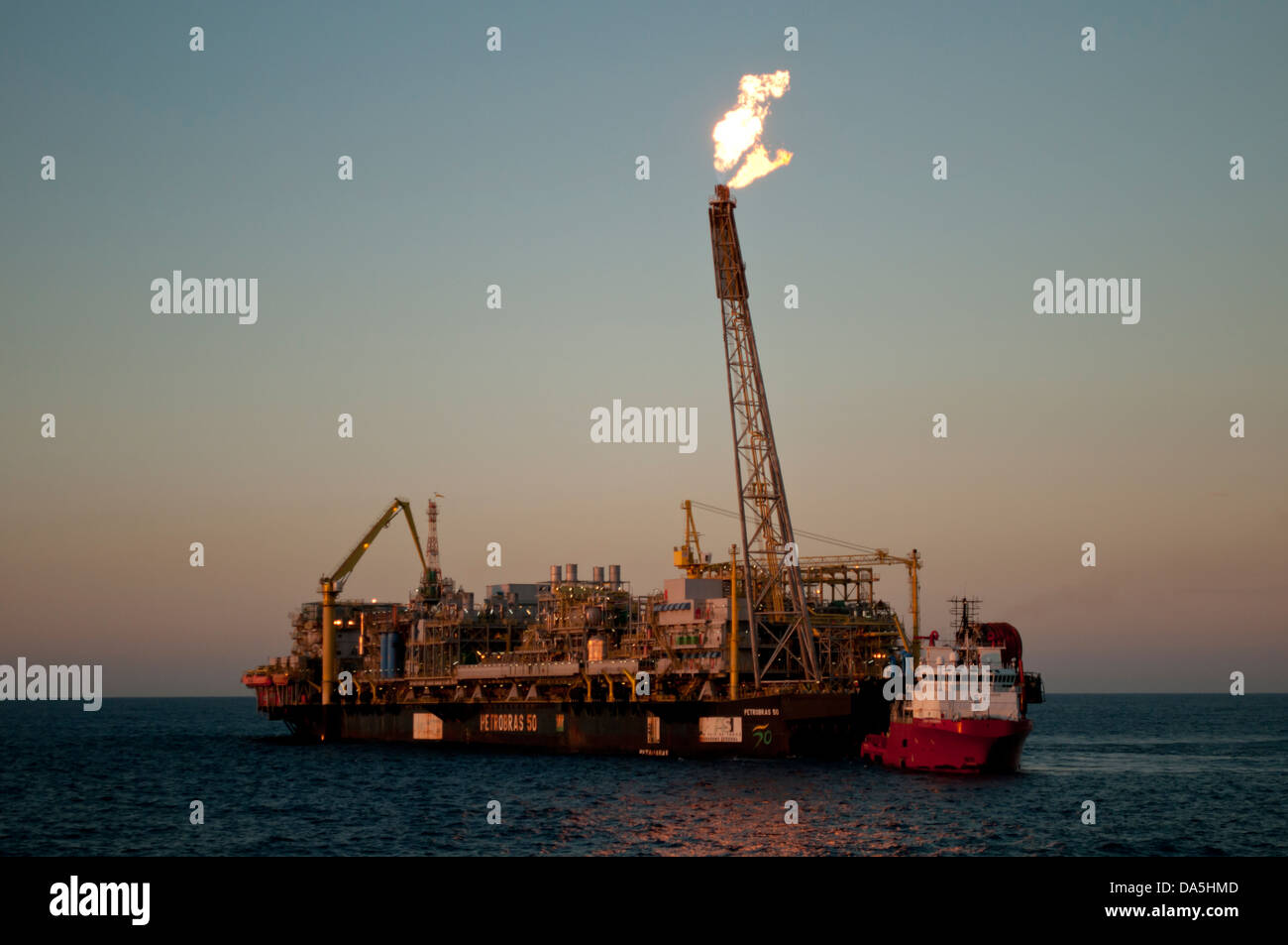 Supply vessel close to FPSO P50 at Campos basin, offshore Rio de ...