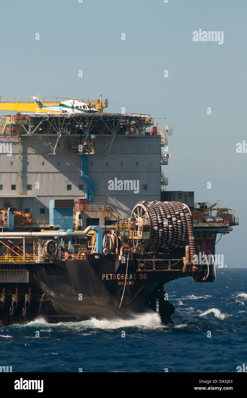 Helicopter landing/landed/departing from FPSO P50 from Petrobras oil ...