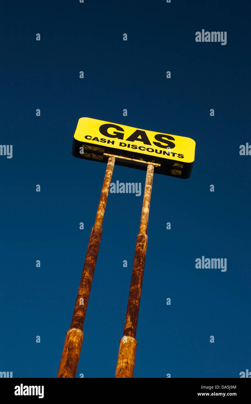 GIANT RUSTED OLD GAS STATION SIGN Stock Photo - Alamy