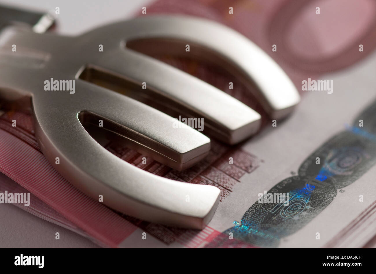ten euro notes in euro money clip Stock Photo - Alamy