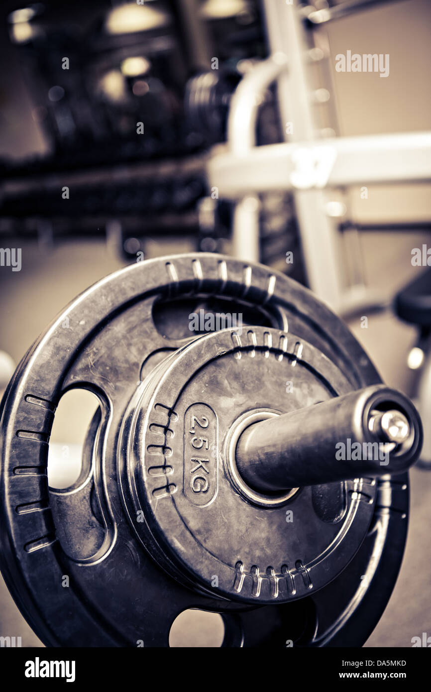 diverse equipment and machines at the gym room Stock Photo - Alamy