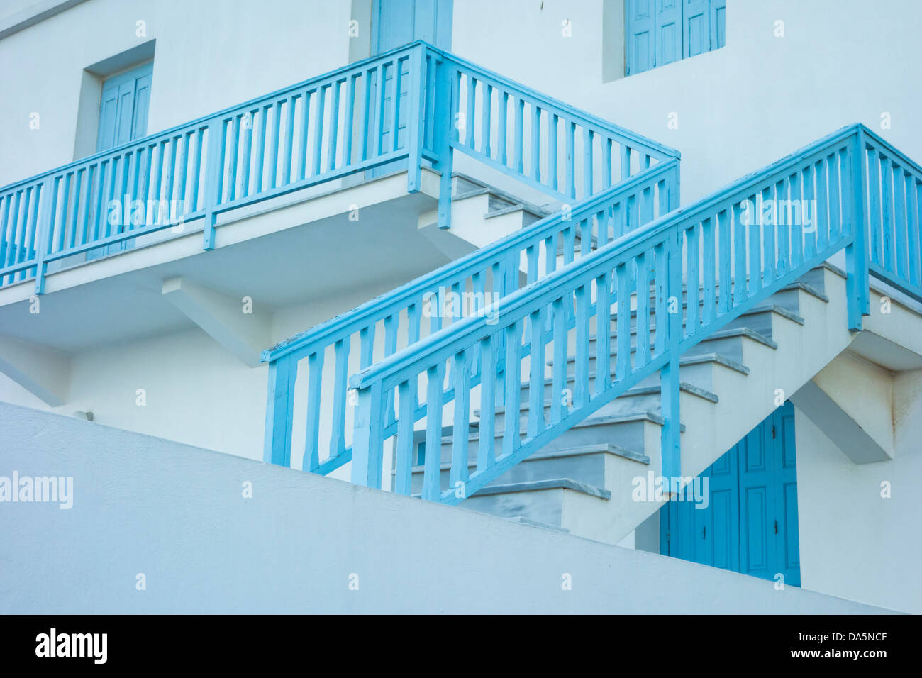 Stairs and blue railing on a white Greek house Stock Photo - Alamy