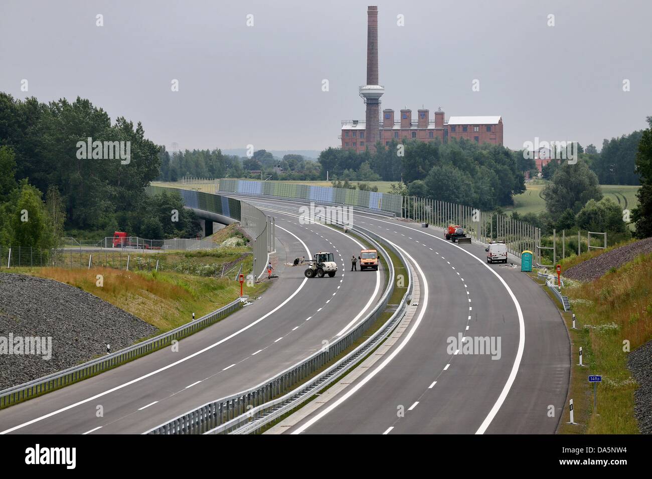 Construction workers complete the last remaining sections of the A72 ...