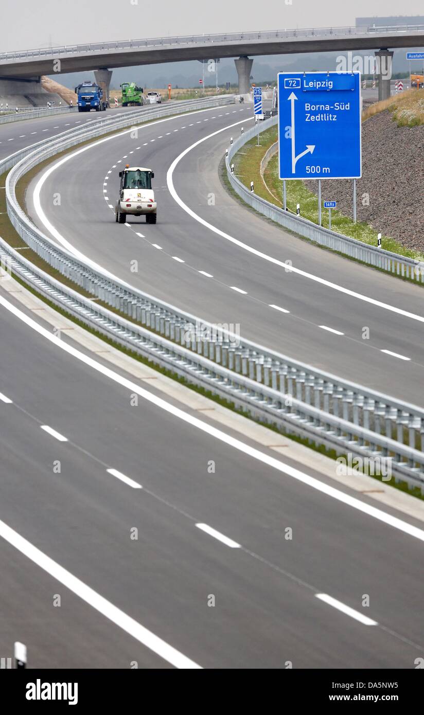 Construction workers complete the last remaining sections of the A72 ...