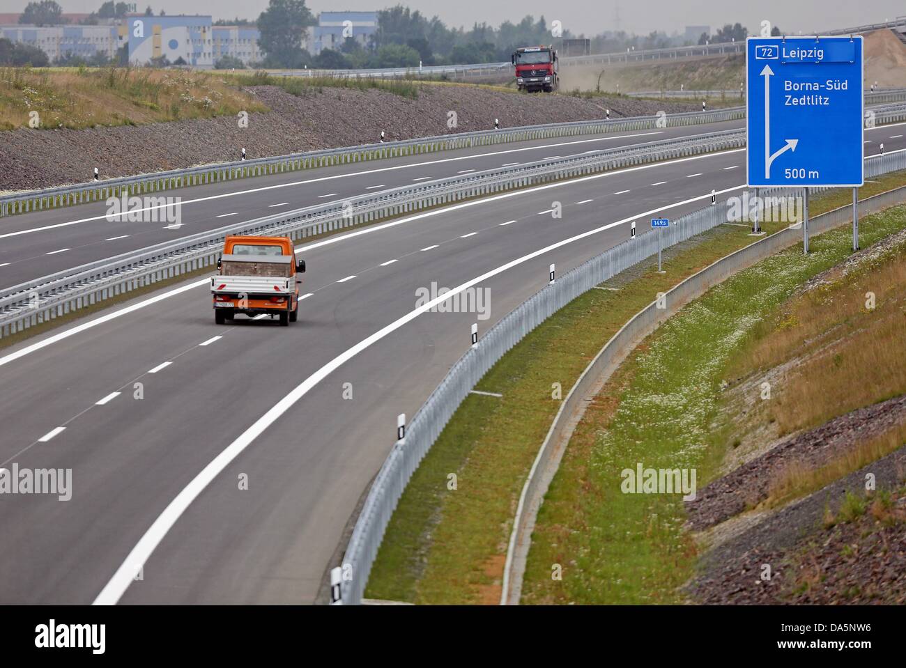 Construction workers complete the last remaining sections of the A72 ...