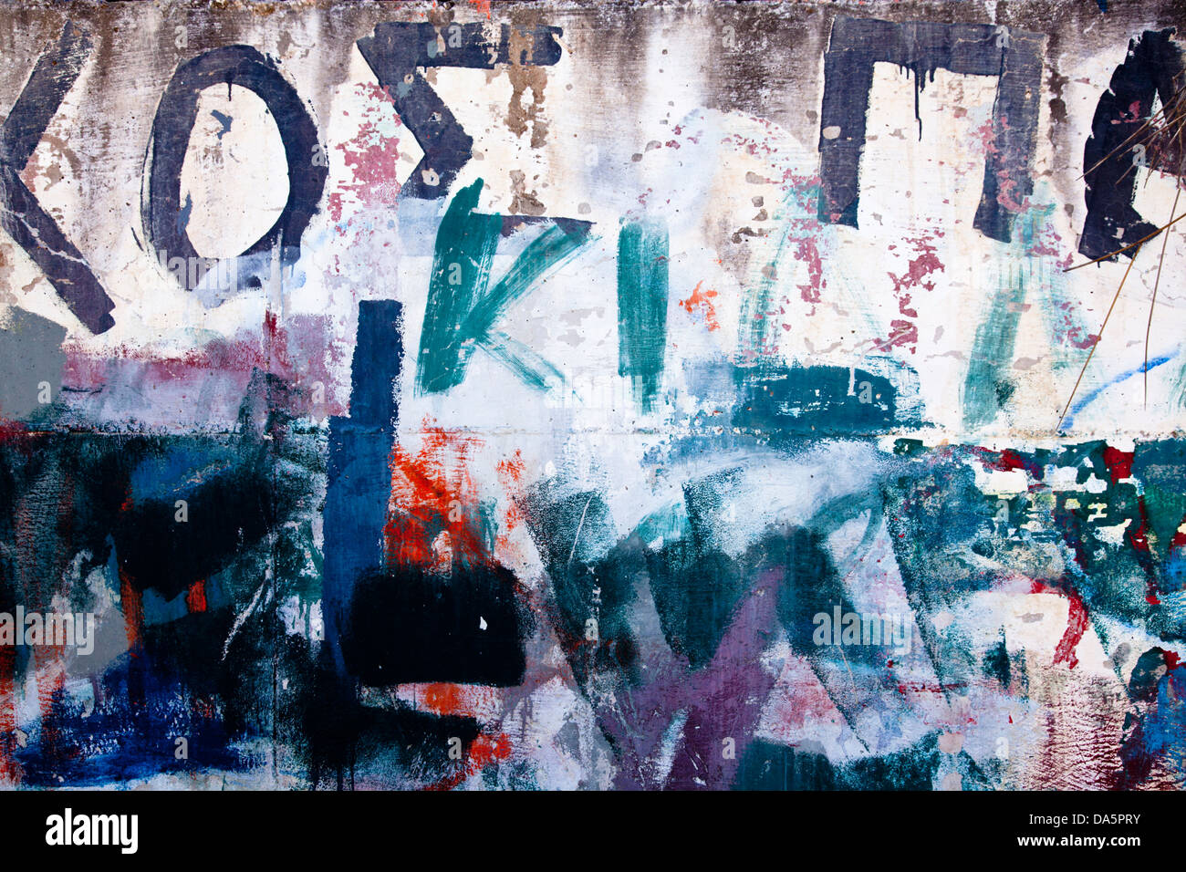 Greek graffiti on the harbour wall at Kalamos Stock Photo - Alamy