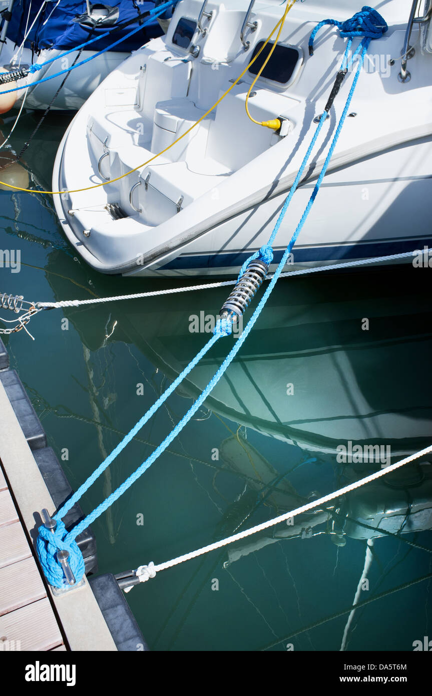 Yacht in safe port at moorings Stock Photo - Alamy