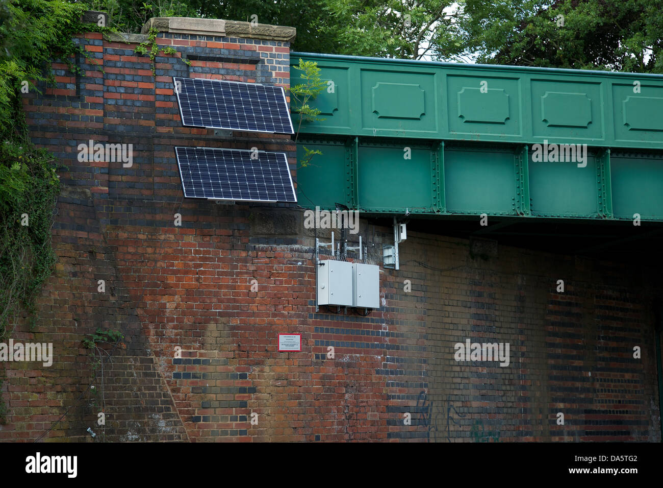 Solar panels powering signals on Emscote Road railway bridge Stock ...