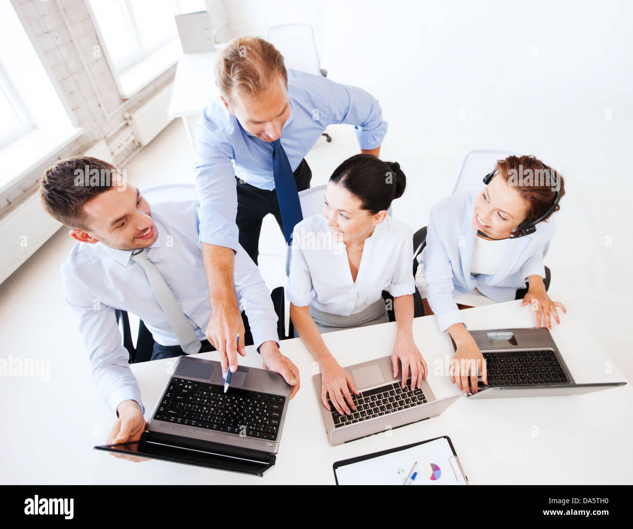 group of people working in call center Stock Photo - Alamy