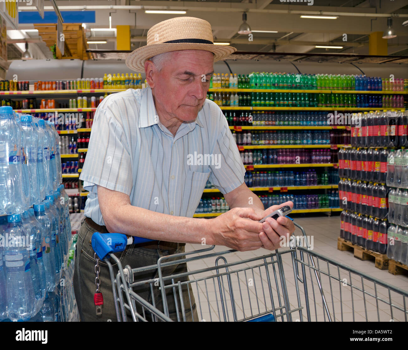 Senior shopping in supermarket Stock Photo - Alamy