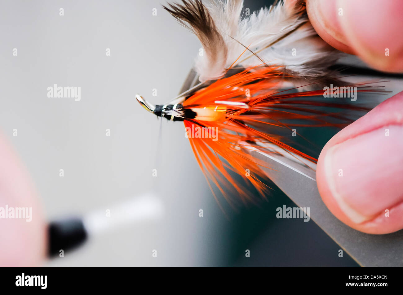 Fly tying demonstration Stock Photo - Alamy