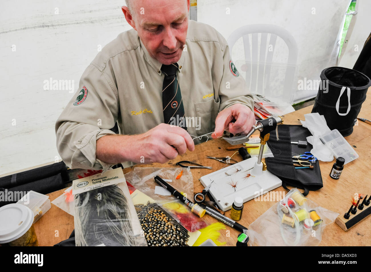 Fly tying demonstration Stock Photo - Alamy
