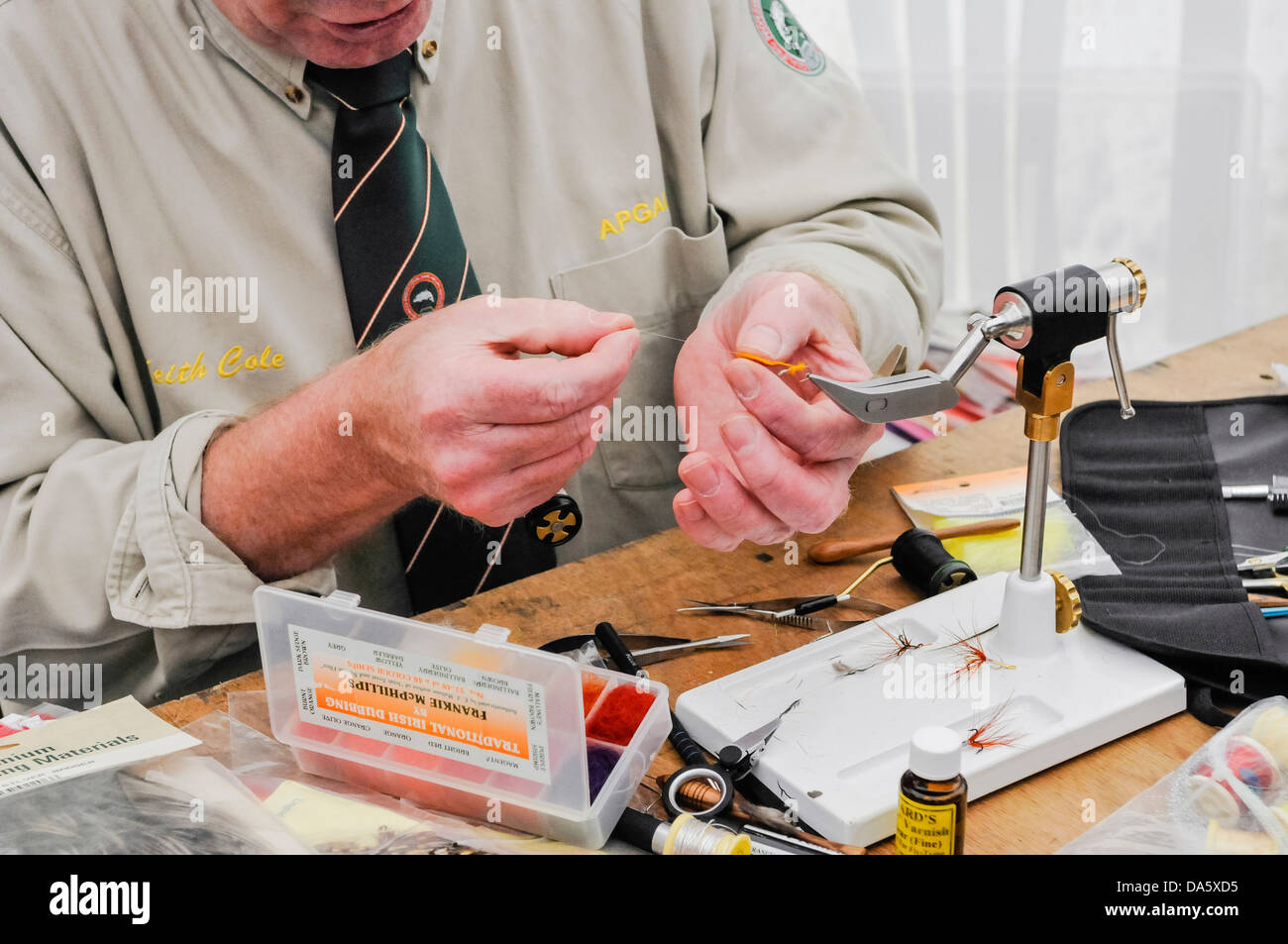 Fly tying demonstration Stock Photo - Alamy