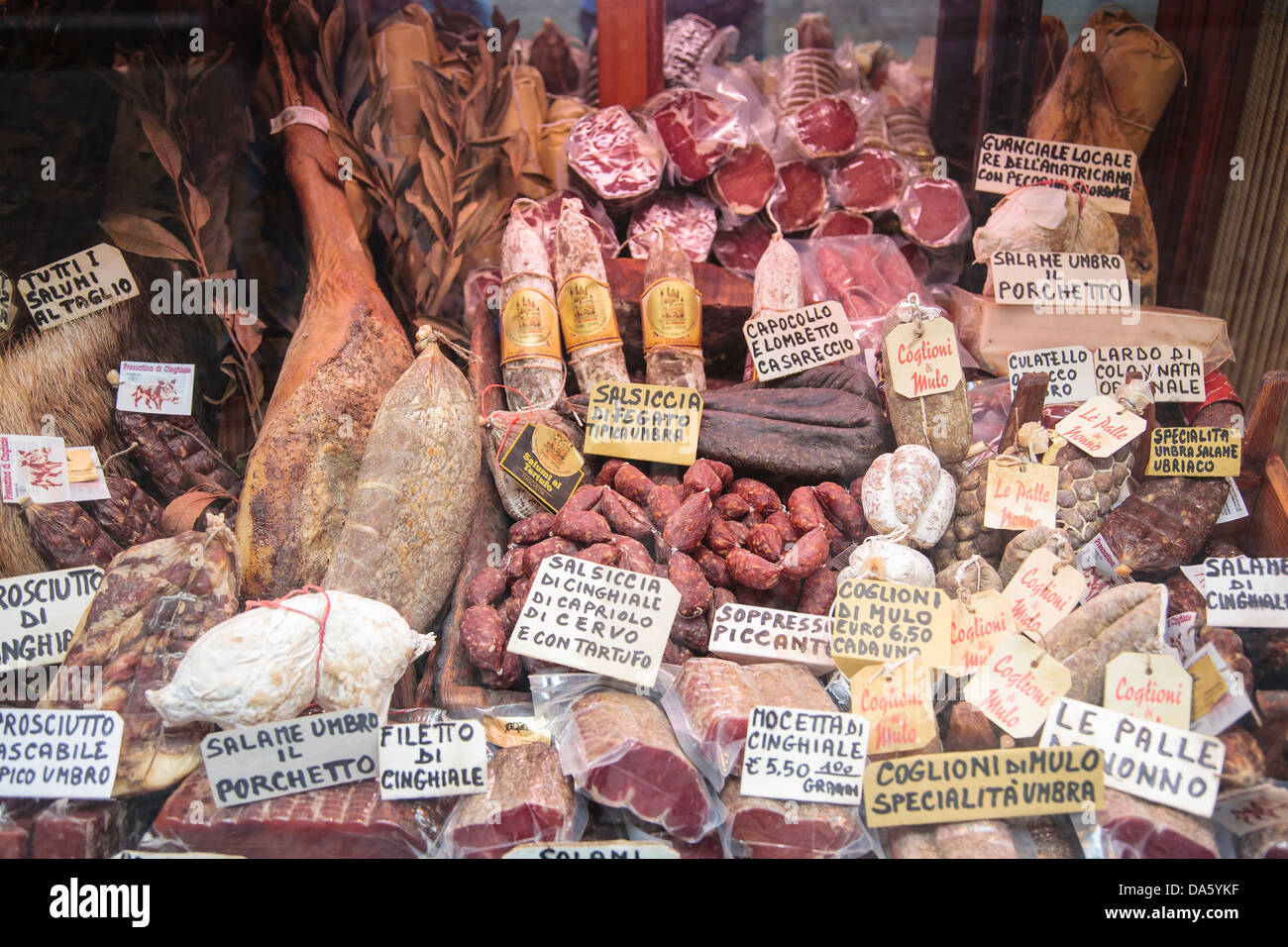 A selection of various meats in an Italian Macelleria or Butchers shop ...