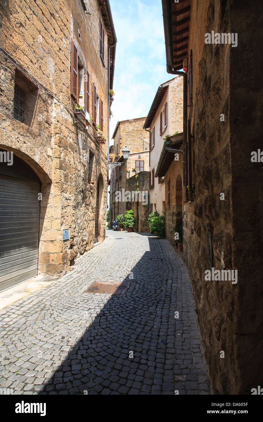 A lovely quaint street in the hill town of Orvieto, Italy Stock Photo ...