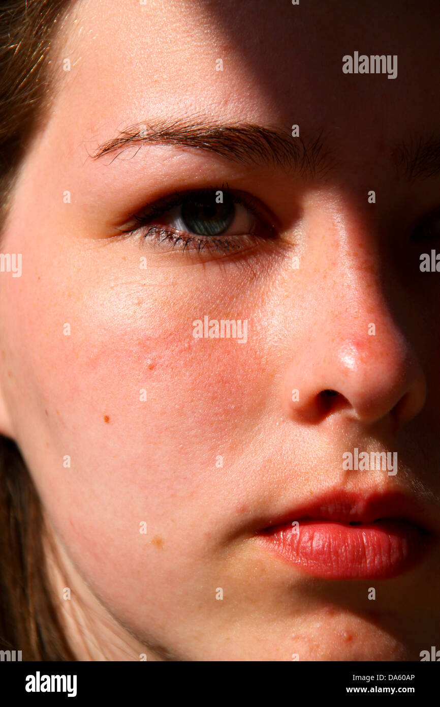 Portrait of sullen teenage girl outside Stock Photo - Alamy