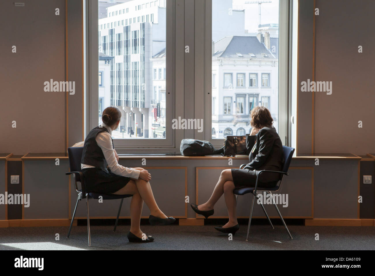 Two women at a window hi-res stock photography and images - Alamy
