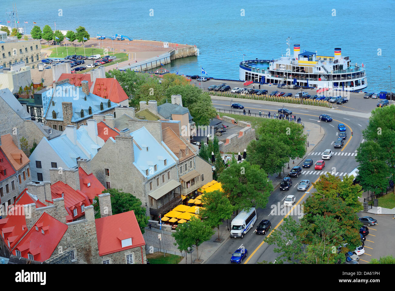 Cruise ship and lower town old buildings with blue sky in Quebec City ...