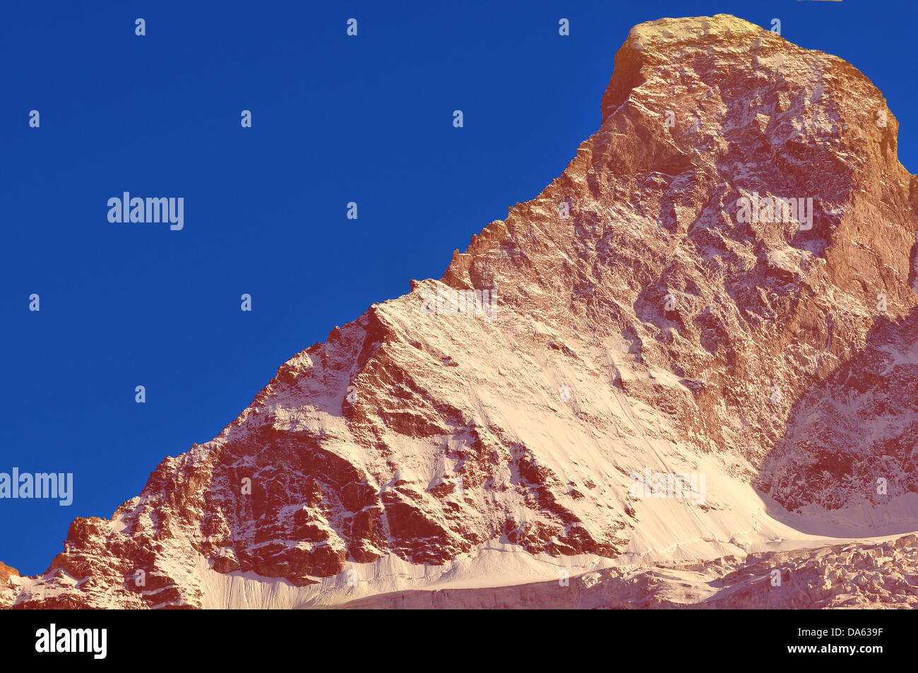the famous Matterhorn and the Hornli ridge, main route up, at sunset ...