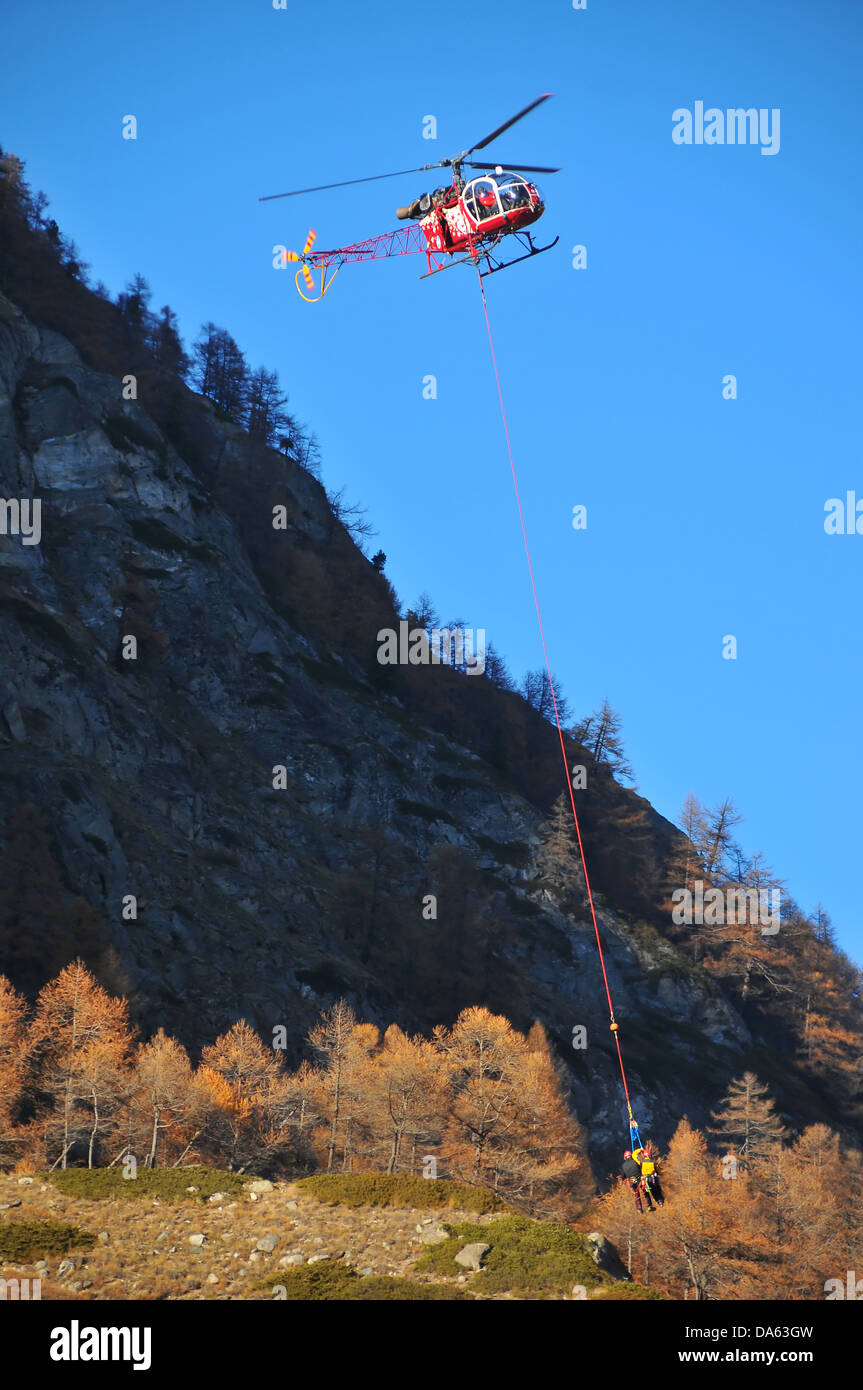 Climber is rescued from a cliff face by helicopter and taken to safety ...