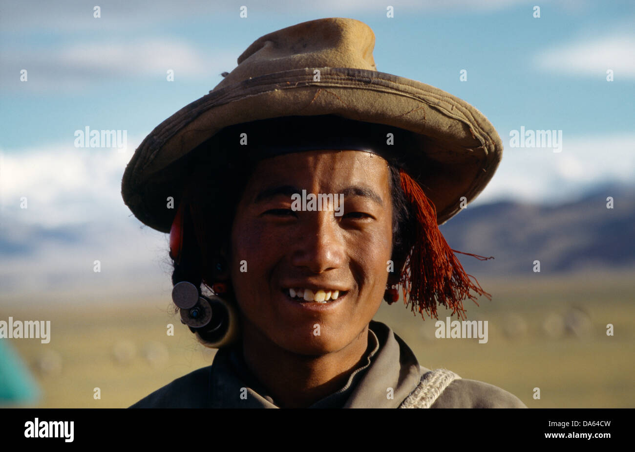 Tibetan man smiling with hat hi-res stock photography and images - Alamy