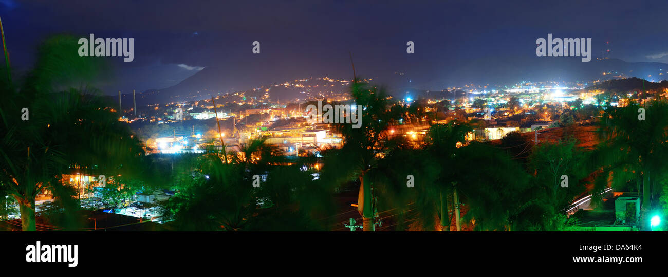 Vacation resort over mountain at night with lights in San Juan, Puerto ...