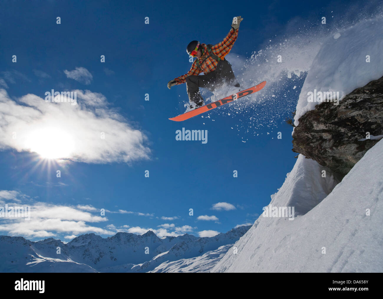Snowboarding mountain jump hi-res stock photography and images - Alamy
