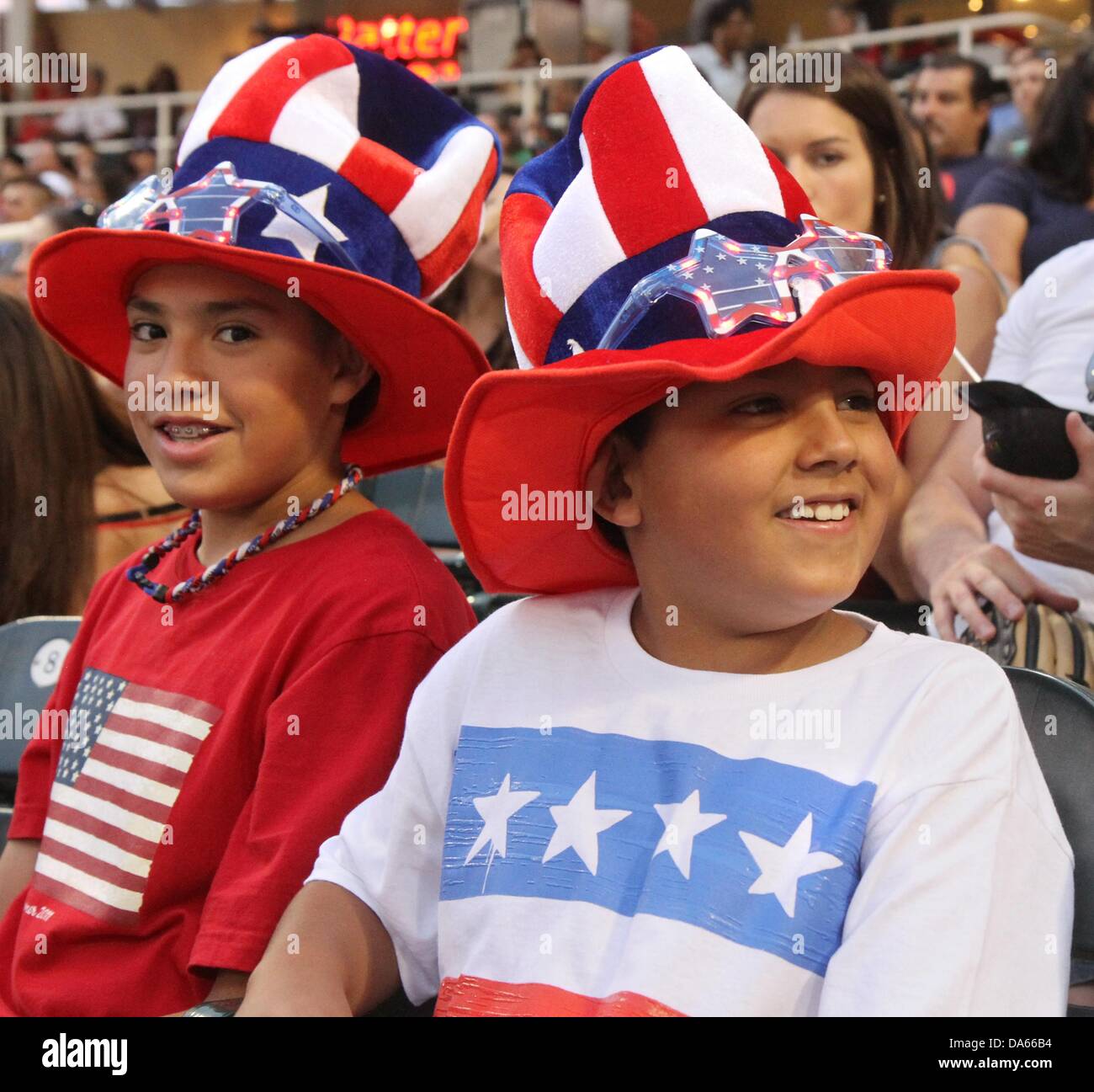 July 4, 2013 - U.S. - Greg Sorber -- Ryan Candelario, 13, and his ...