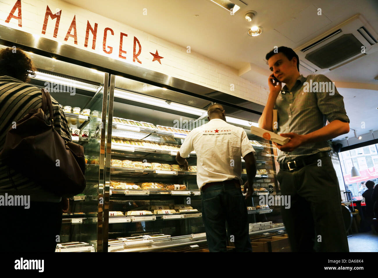 London England Man Stacking the Shelves In Pret A Manger And ...