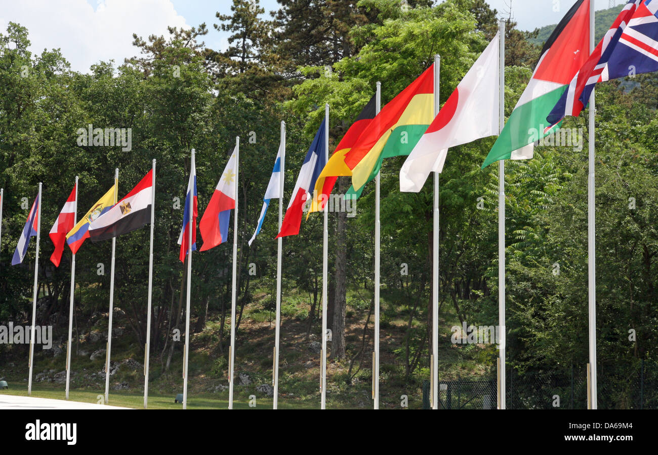 set of coloured flags of many nations of the world that waving all ...
