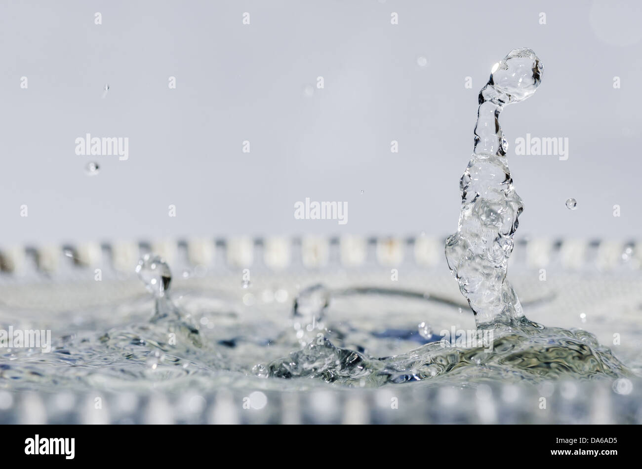 Water splash in the motion nature concept background Stock Photo - Alamy